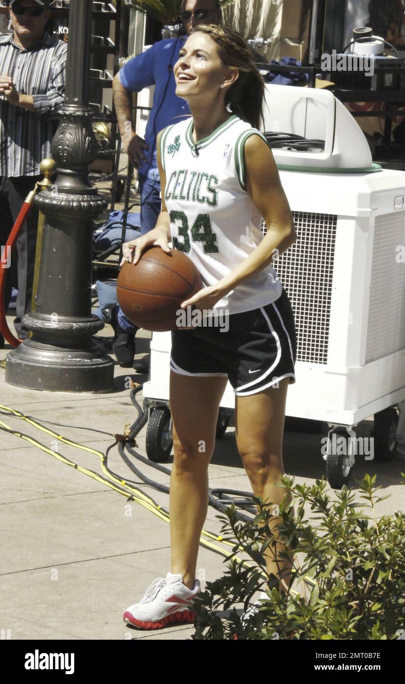 Maria Menounos practices her basketball moves with Paul Pierce during ...