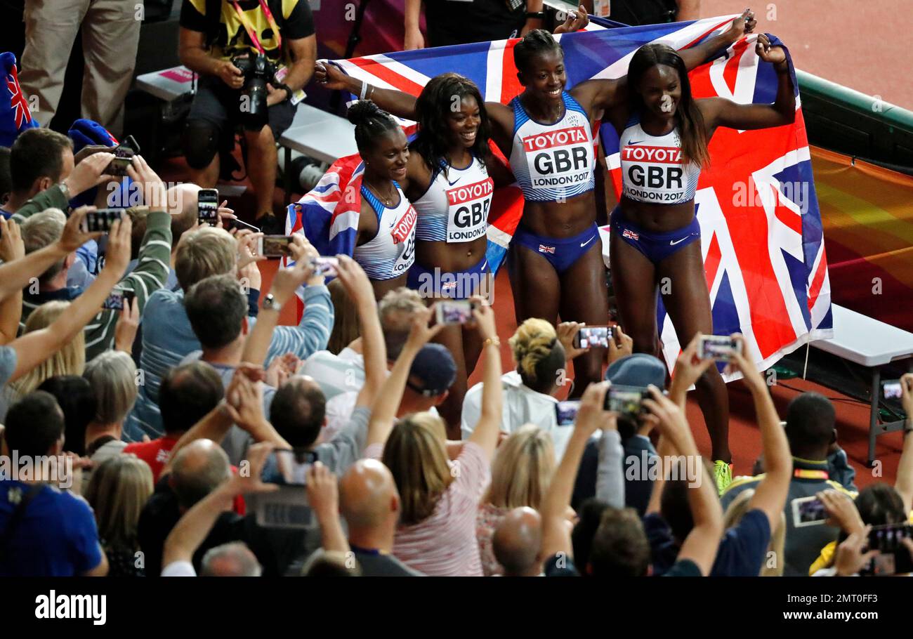 British team celebrate after taking silver in the Women's 4x100m relay ...