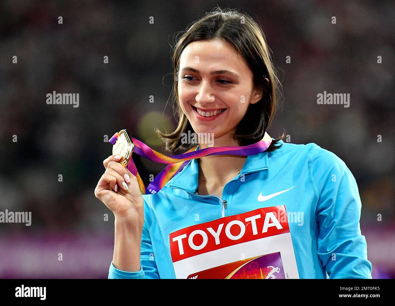 Women's high jump gold medalist Russia's Maria Lasitskene holds her ...