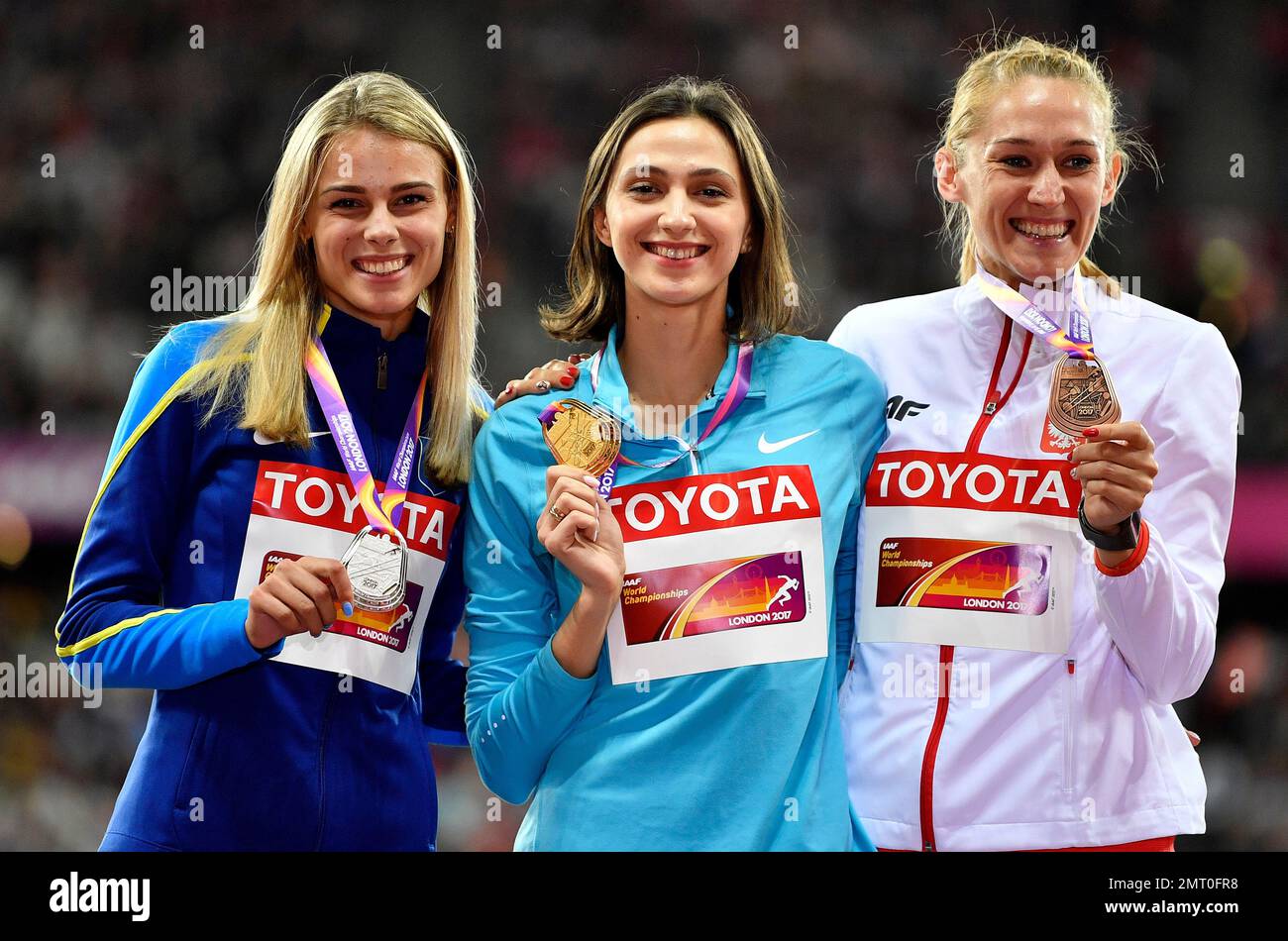 Women's high jump gold medalist Russia's Maria Lasitskene, centre ...