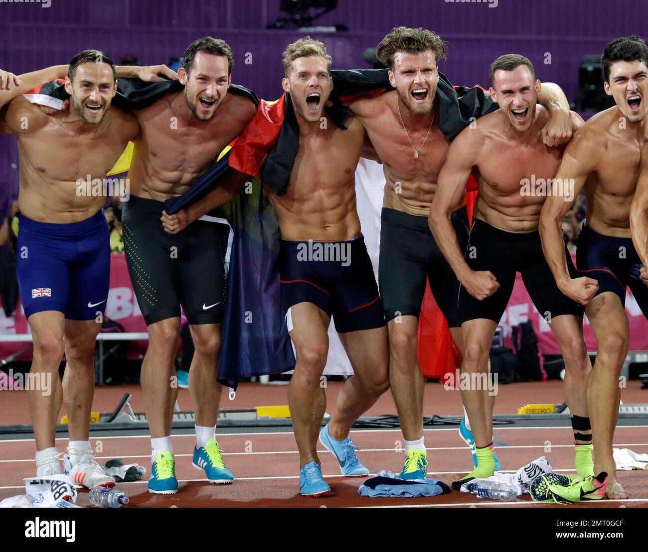 France's gold medal winner Kevin Mayer, center, is flanked by Germany's ...