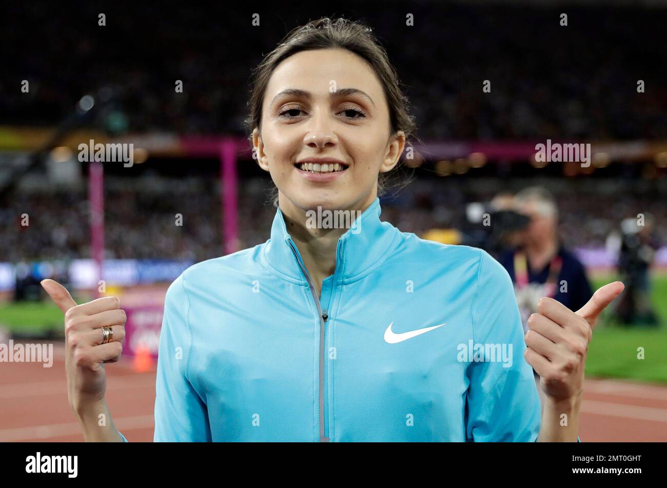 Russia's Maria Lasitskene celebrates without a flag after winning the ...
