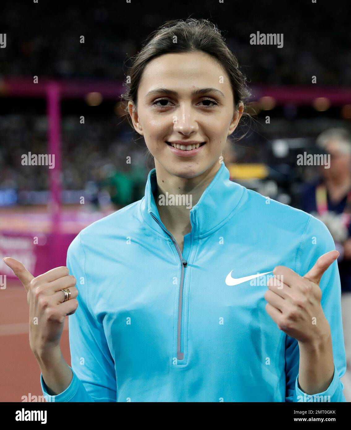 Russia's Maria Lasitskene celebrates without a flag after winning the ...