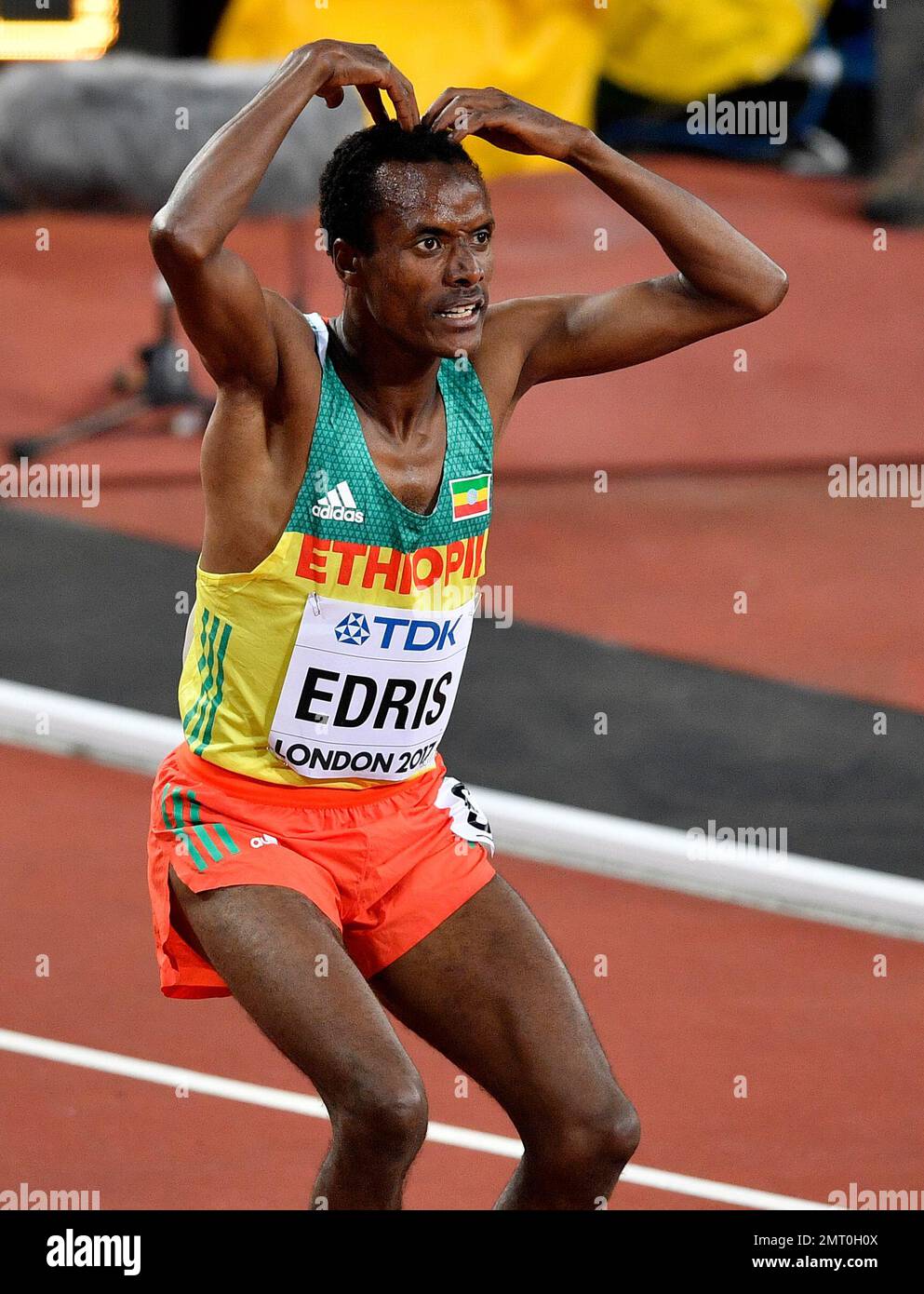 Ethiopia's Muktar Edris celebrates after winning the Men's 5000 meters ...