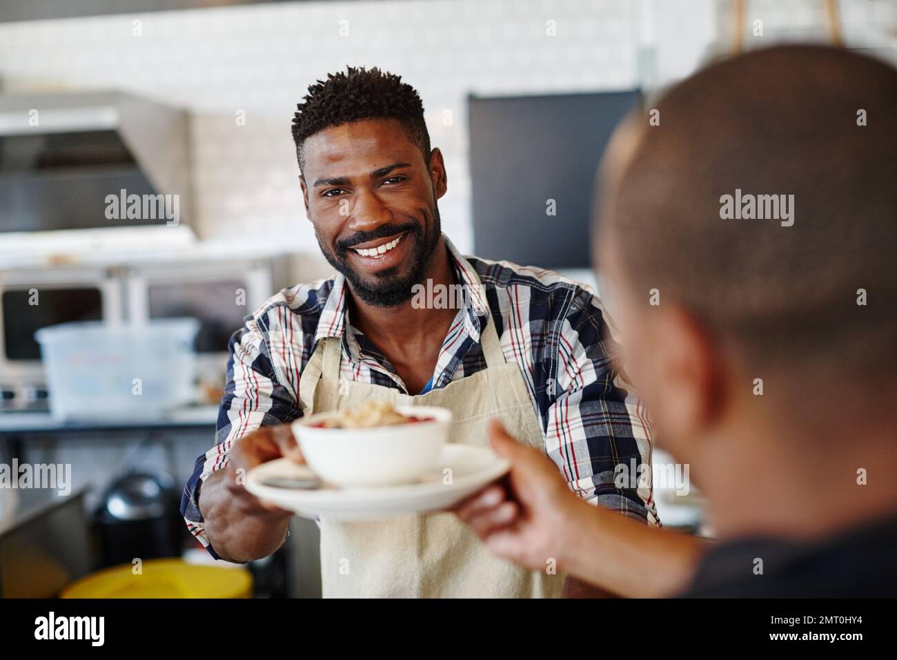 Man serving cafe hi-res stock photography and images - Alamy