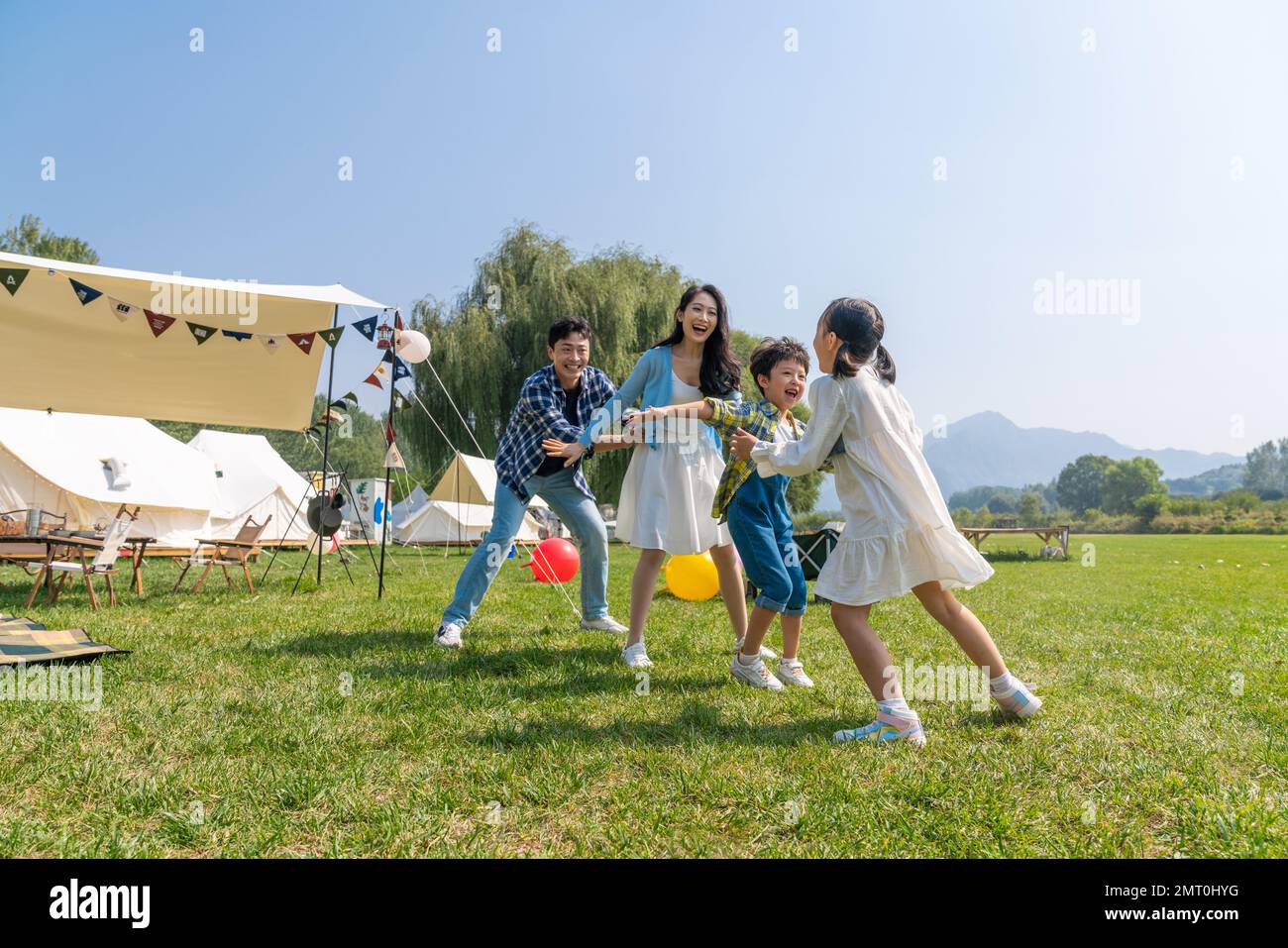 Play happily family hi-res stock photography and images - Alamy
