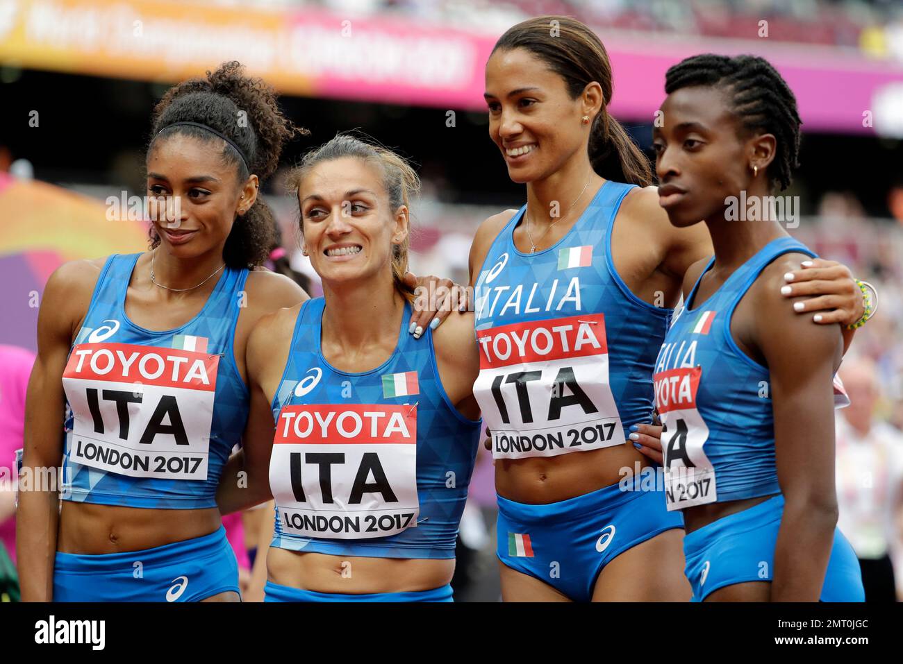 The Italian team smile after a Women's 4x400m relay heat during the ...