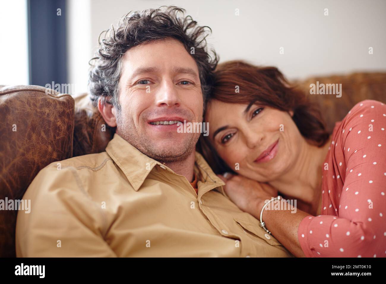 Its a lazy weekend and we love it. a husband and wife relaxing together ...