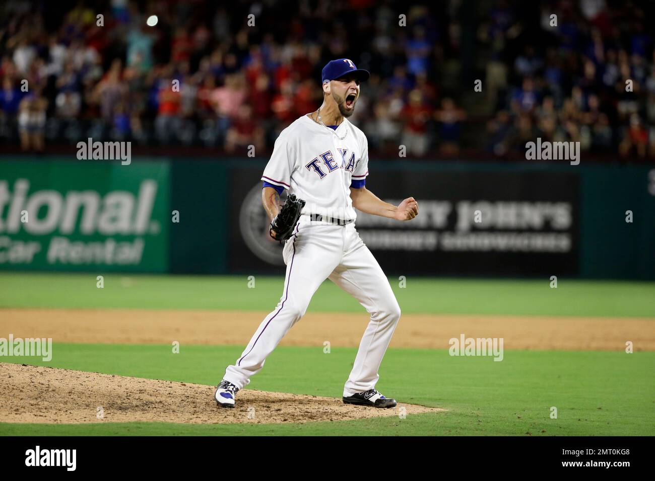 Texas Rangers relief pitcher Alex Claudio celebrates after getting ...