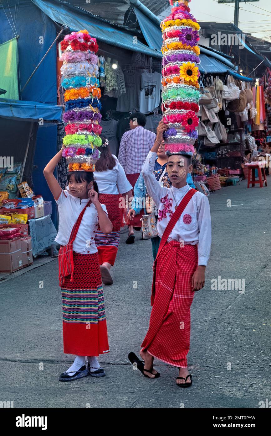 Mon children in traditional dress during the morning alms ceremony in ...