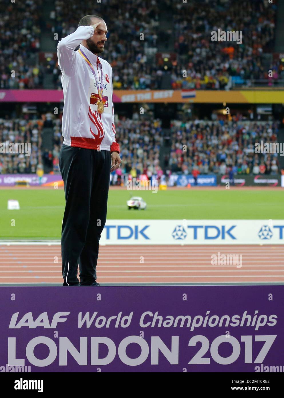 Turkey's Ramil Guliyev, the gold medal winner, salutes during the medal ...