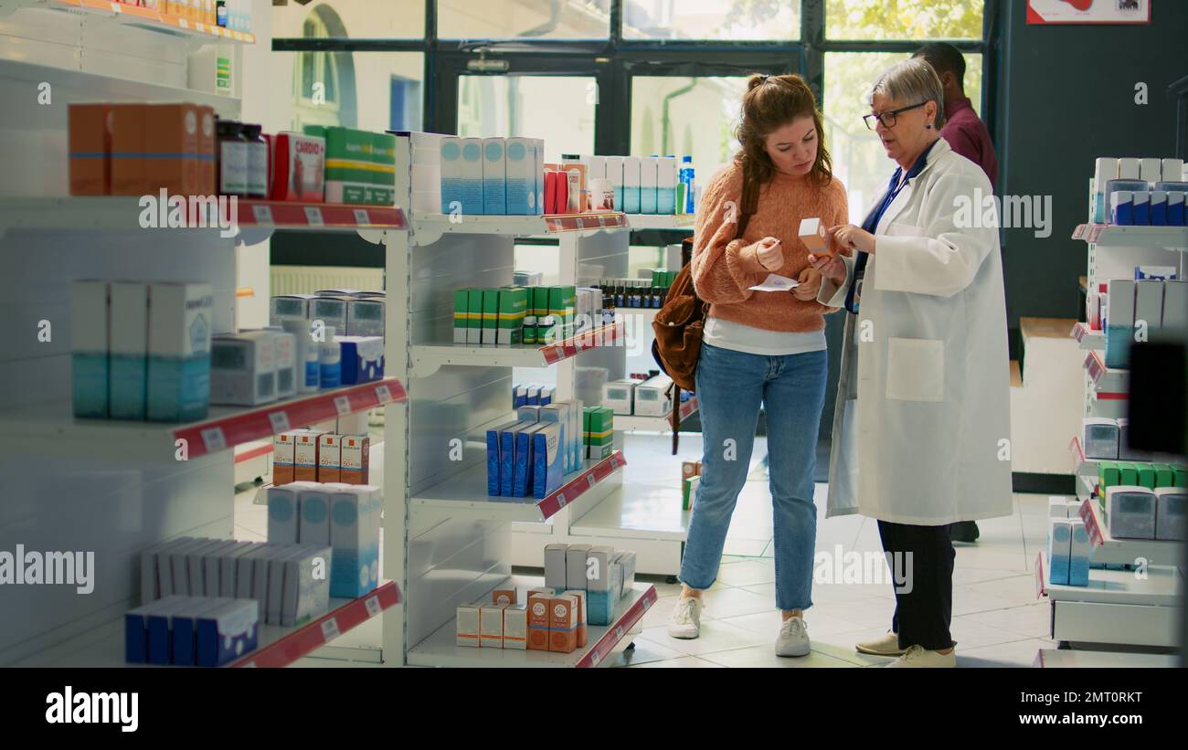 Female customer asking specialist about drugs treatment on prescription ...