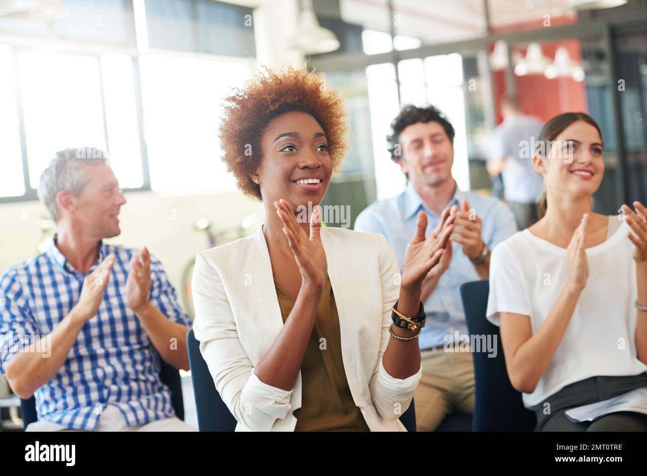 Give yourselves a round of applause. A group of colleagues applauding a work presentation Stock ...