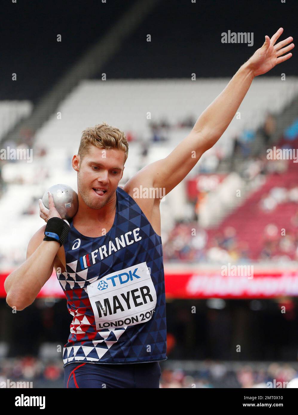 France's Kevin Mayer makes an attempt in the shot put of the decathlon ...
