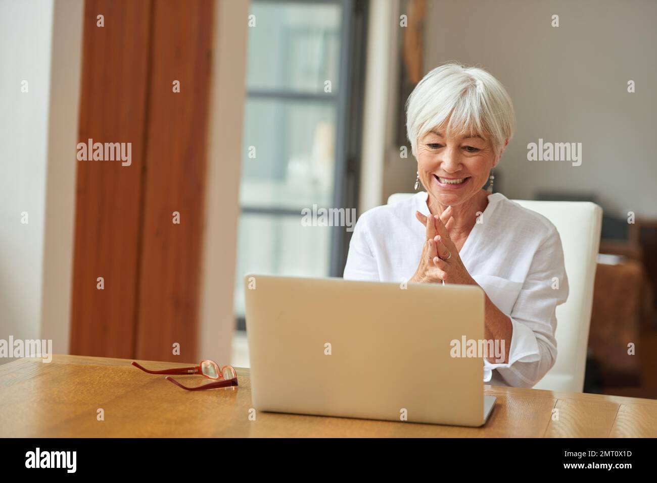 The internet makes life so much easier. a senior woman using a laptop ... The internet makes life so much easier. a senior woman using a laptop ...