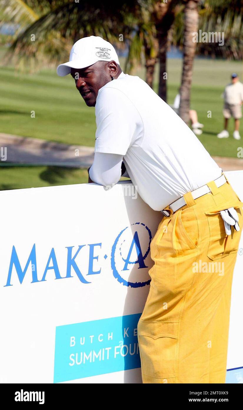 NBA legend Michael Jordan casually smokes a cigar and tosses around a ...