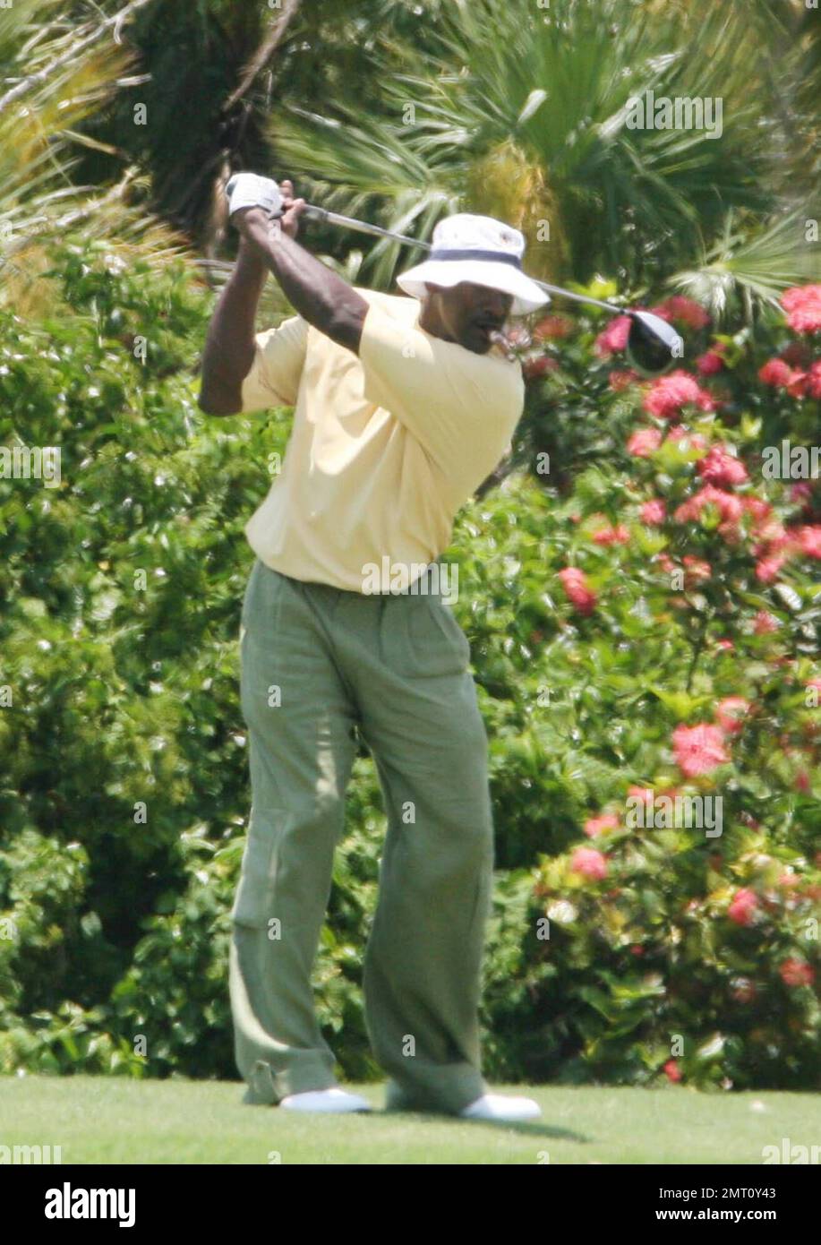 Exclusive!! NBA legend Michael Jordan takes time out to enjoy a game of ...