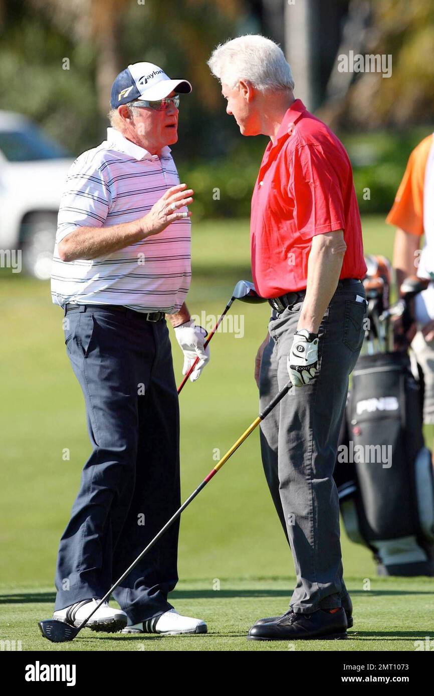 Exclusive!! President Bill Clinton and James Caan play on day three of ...