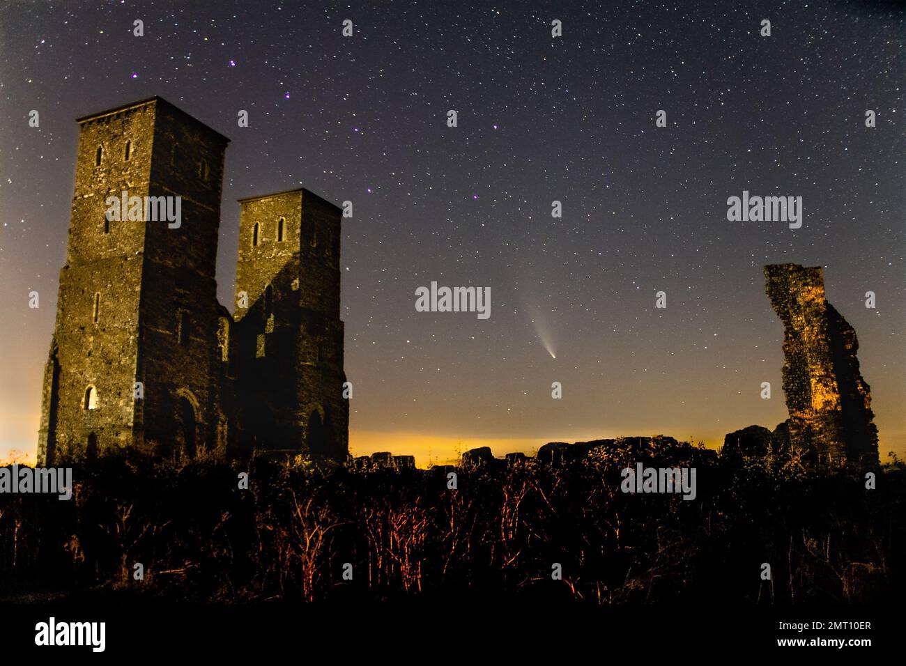 A scenic shot of the Reculver Towers and Roman Fort at night in UK ...