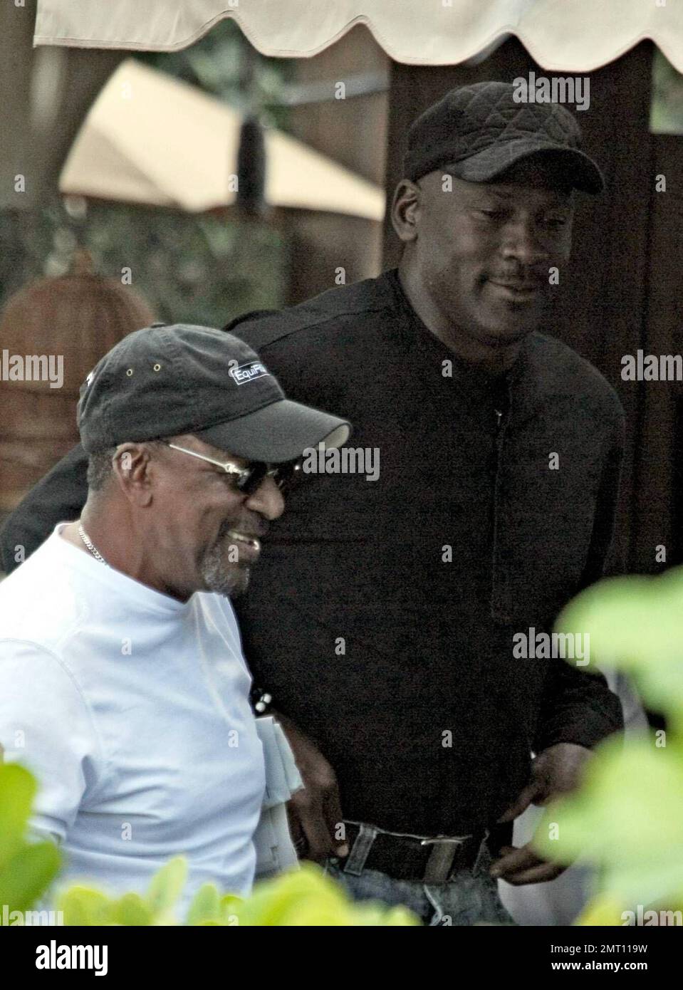 NBA legend Michael Jordan enjoys a refreshing beverage during an ...
