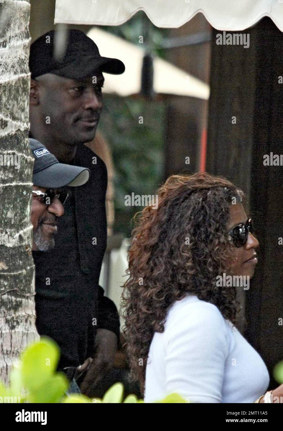 NBA legend Michael Jordan enjoys a refreshing beverage during an ...