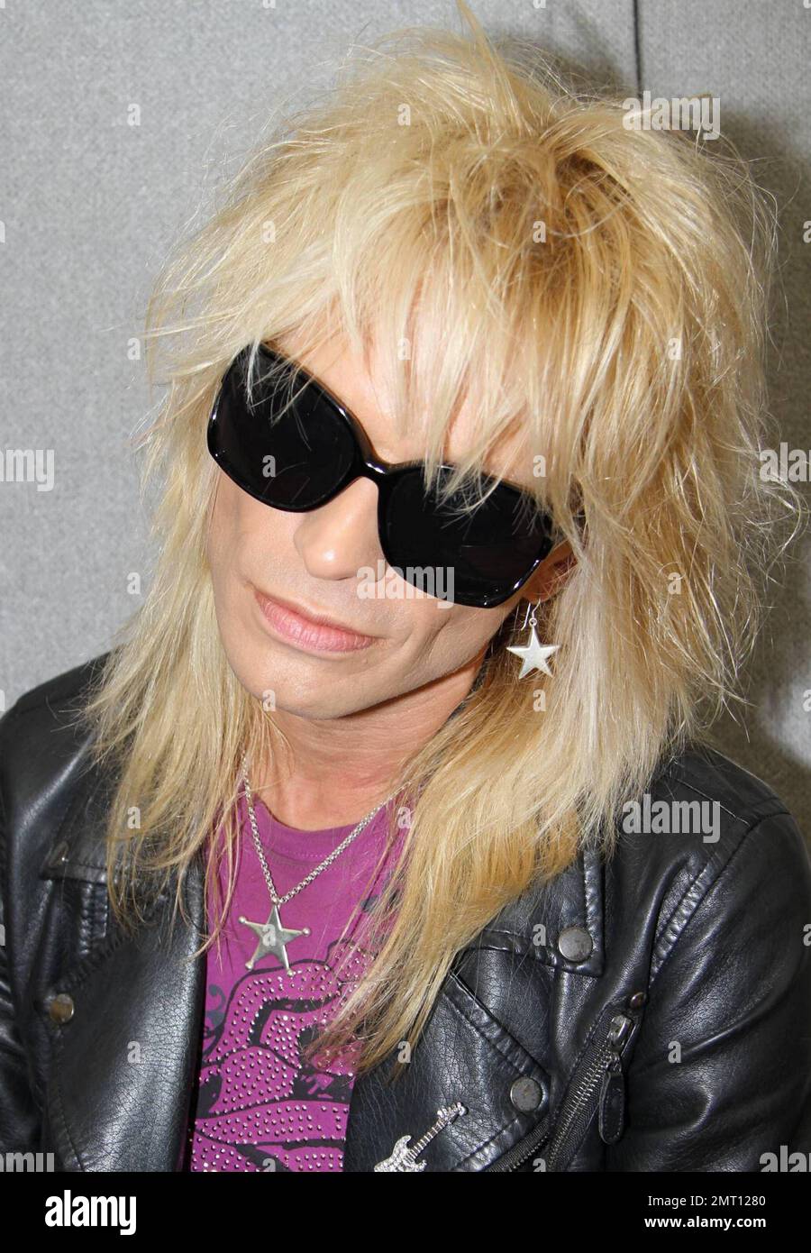 Finnish rock musician Michael Monroe (Matti Fagerholm) poses backstage ...