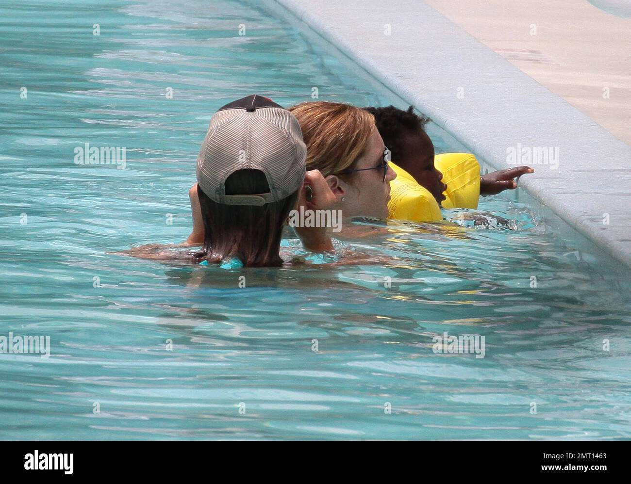 The Biggest Looser's trainer, Jillian Michaels, enjoys some pool time ...