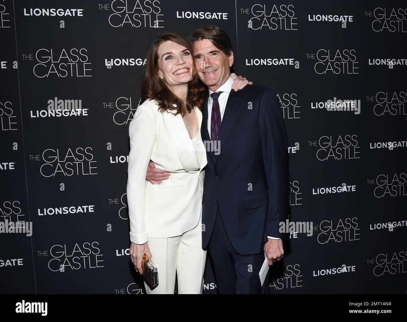 Author Jeannette Walls, left, and husband John Taylor attend the ...