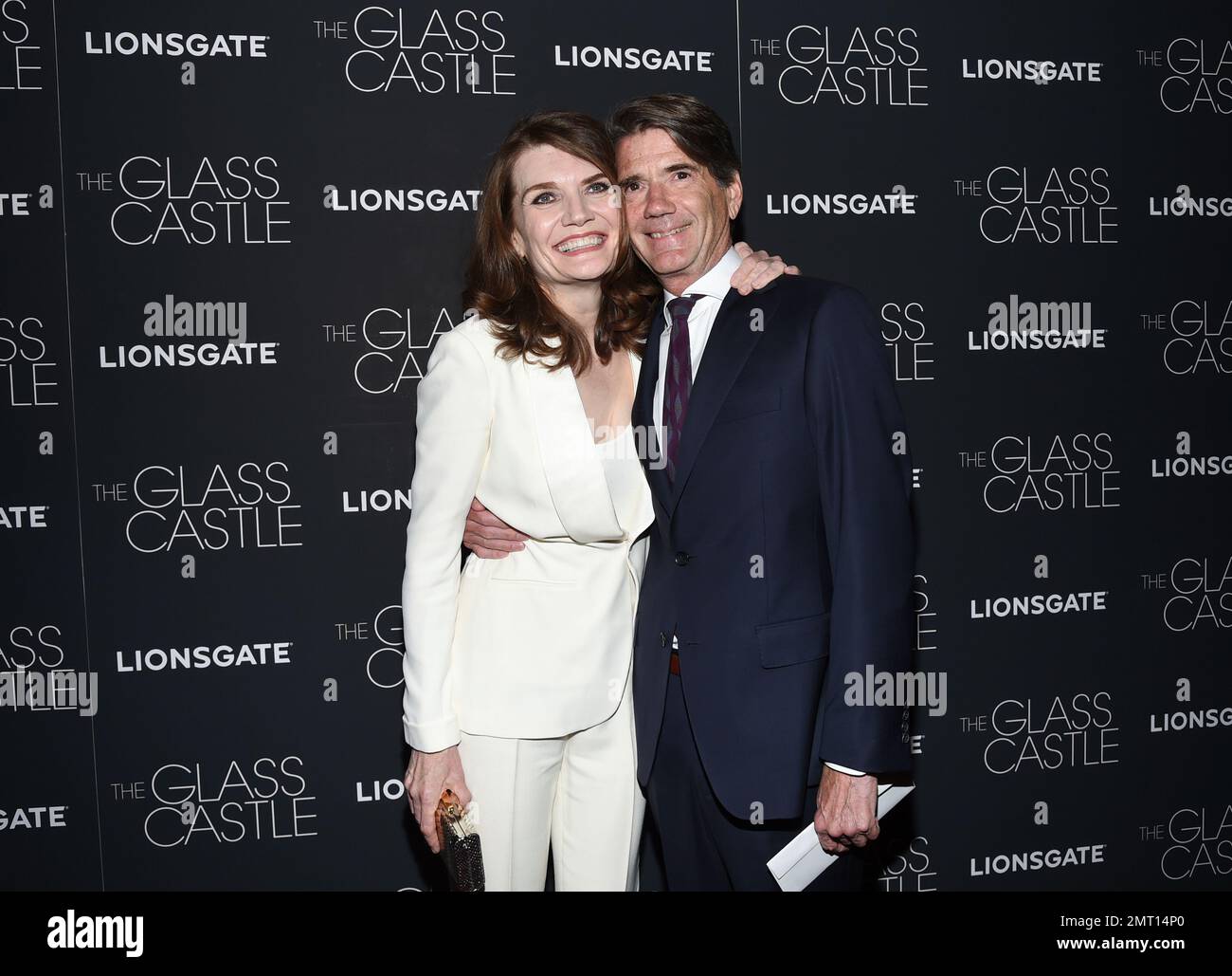 Author Jeannette Walls, left, and husband John Taylor attend the ...