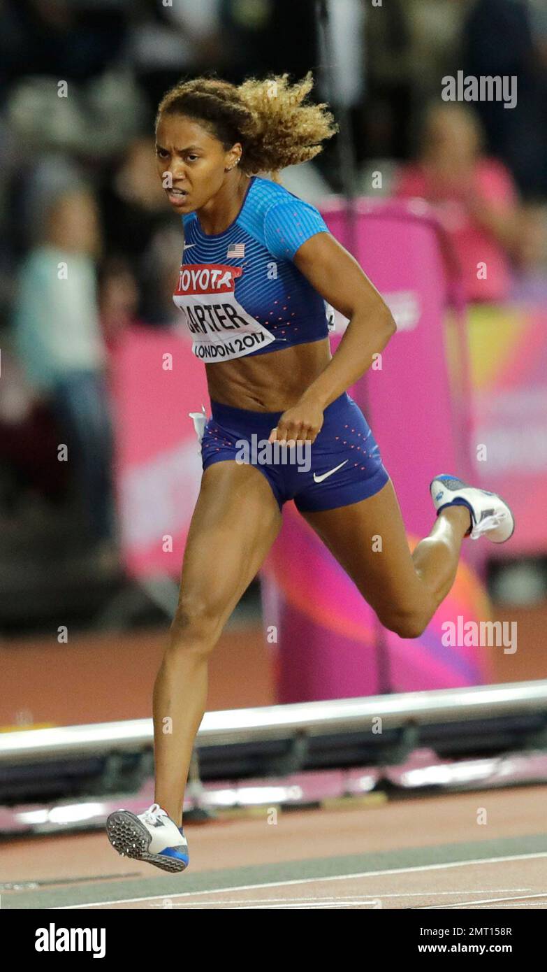 United States' Kori Carter crosses the finish line to win gold in the ...