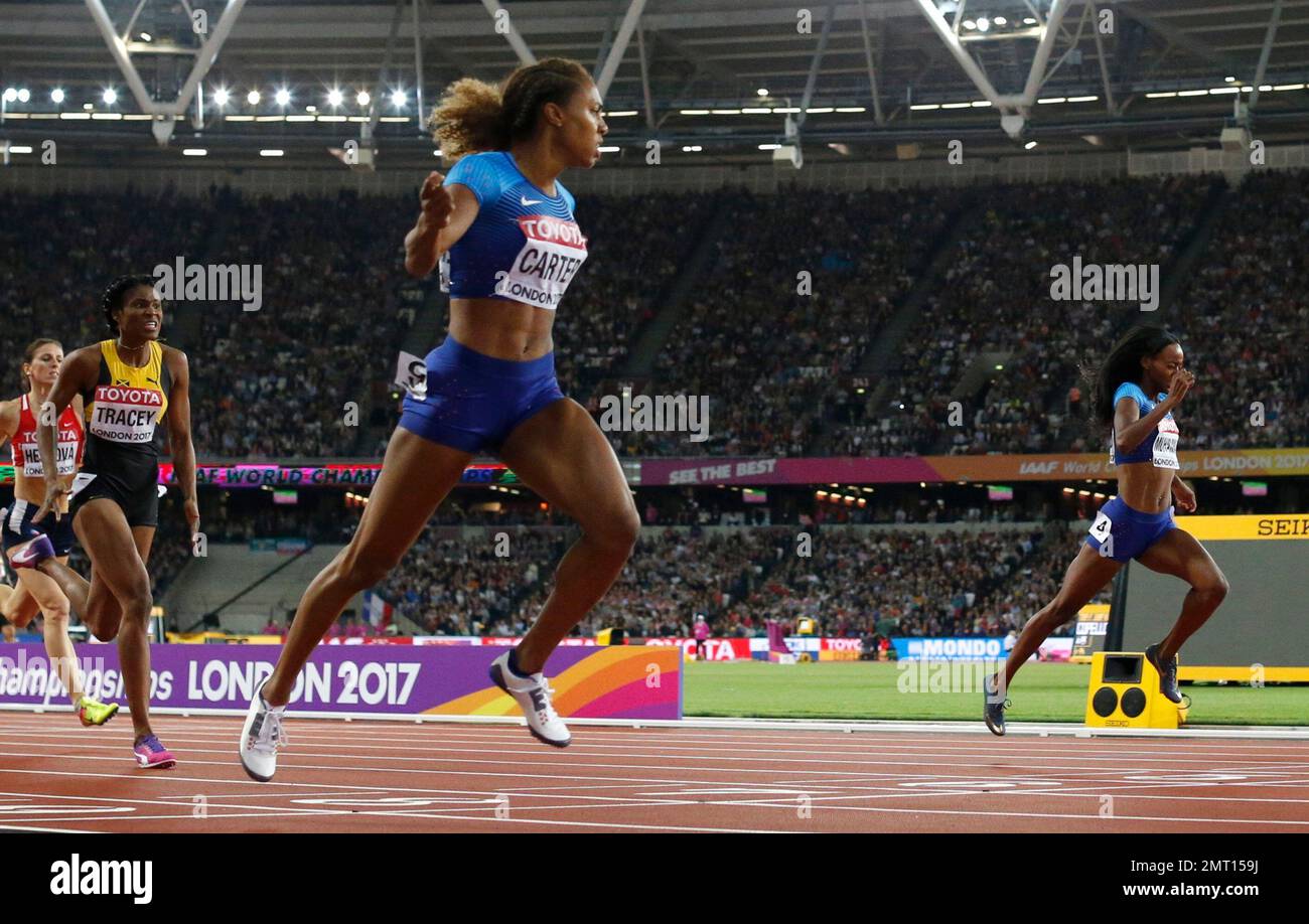 United States' Kori Carter crosses the line to win gold in the women's ...