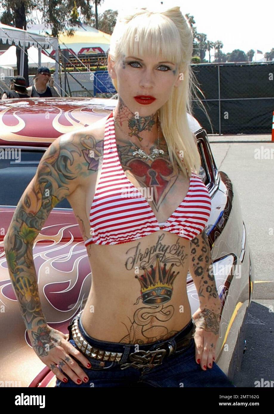 EXCLUSIVE!! Michelle Bombshell McGee poses on a bike at the Ink N Iron Fest in 2007. McGee has ...