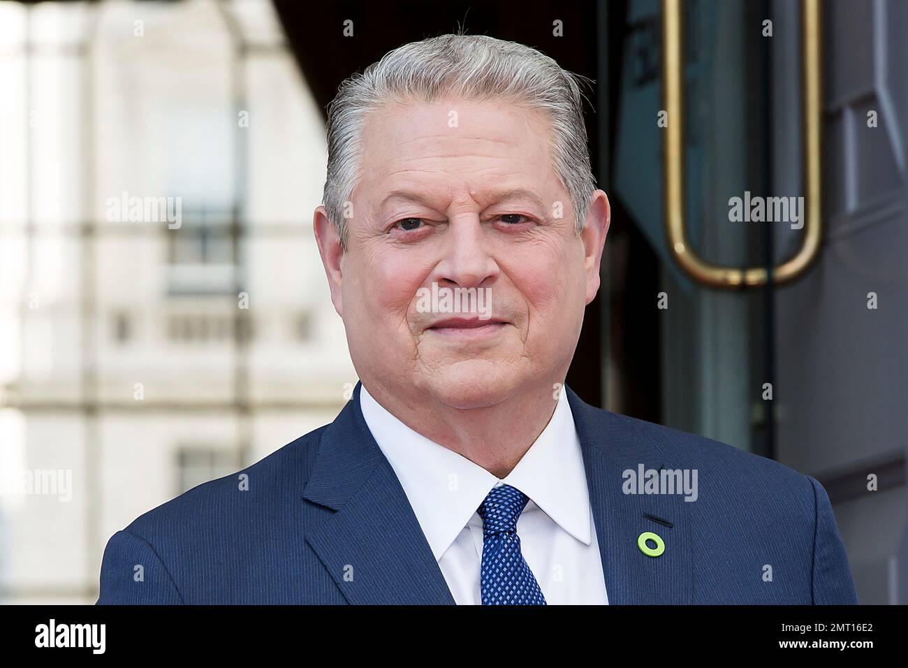Former U.S. Vice President Al Gore poses for photographers on arrival ...