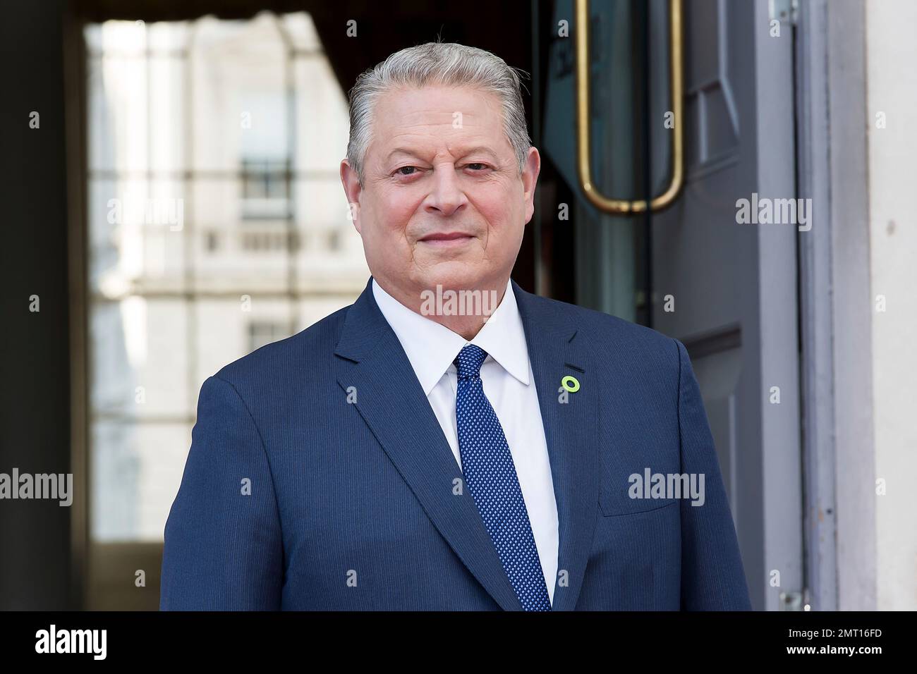 Former U.S. Vice President Al Gore poses for photographers on arrival ...