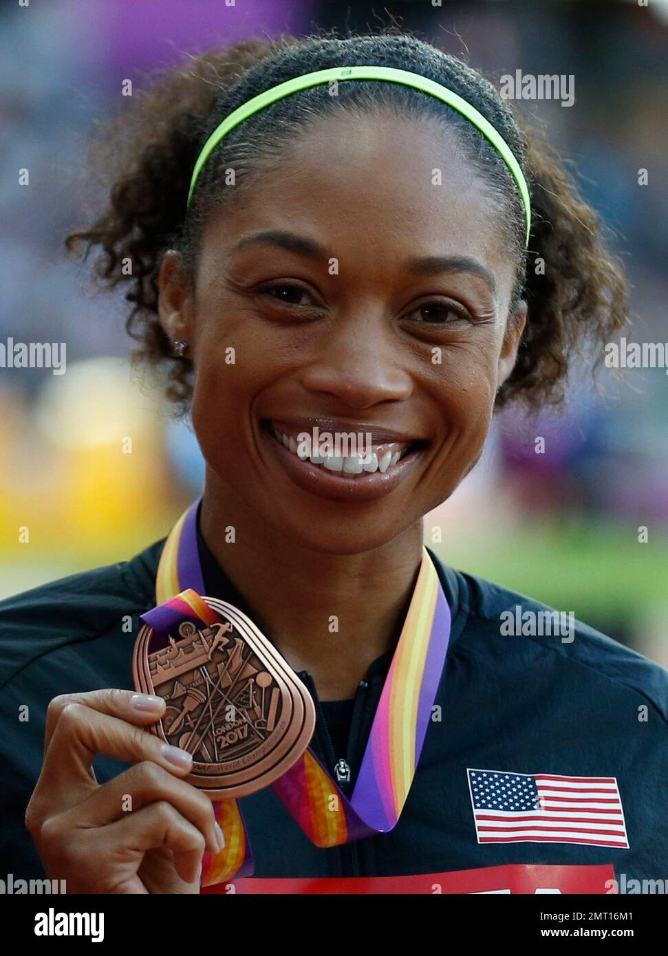 United States' Allyson Felix, bronze poses for photographers after the ...