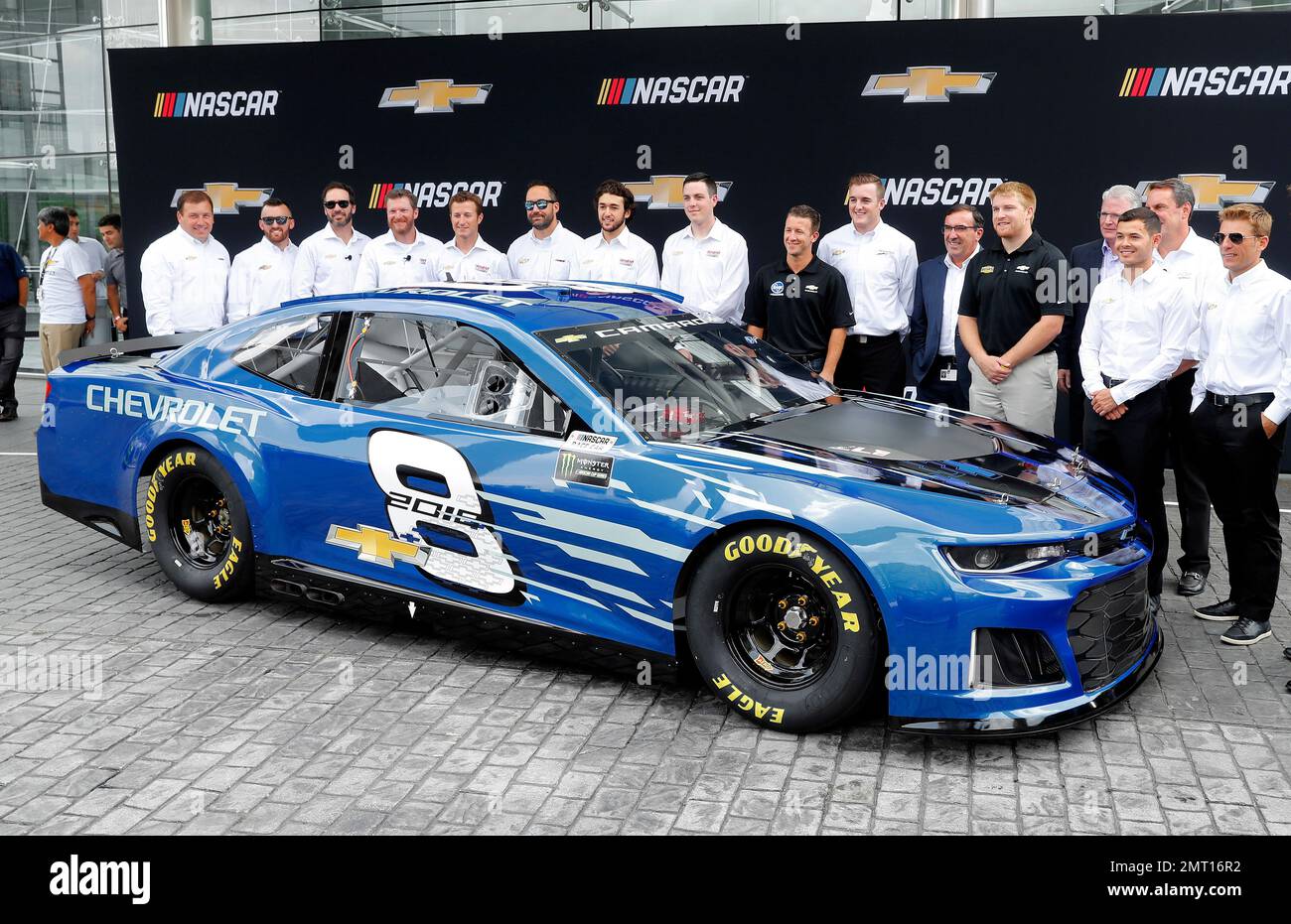 Chevrolet drivers pose with the 2018 Chevrolet Camaro ZL1 being ...