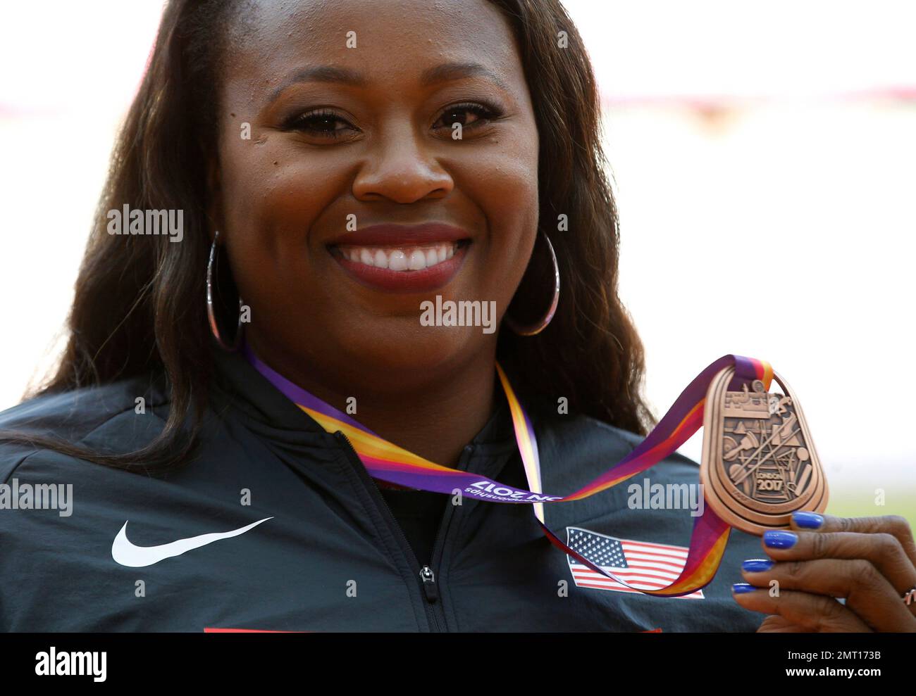 United States' Michelle Carter smiles after she was awarded the bronze ...