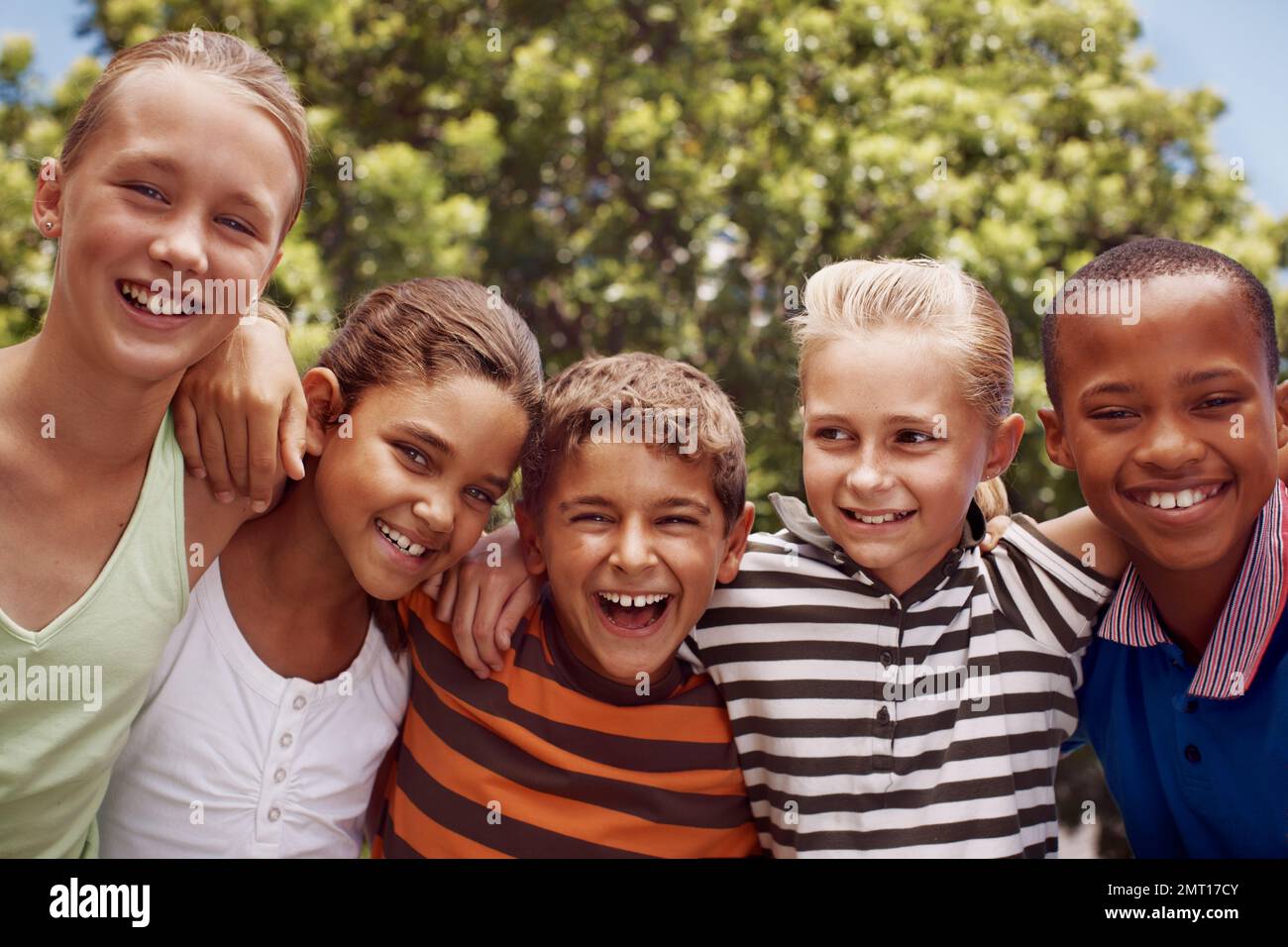 Theyre such good friends. A group of friends hugging each other while ...