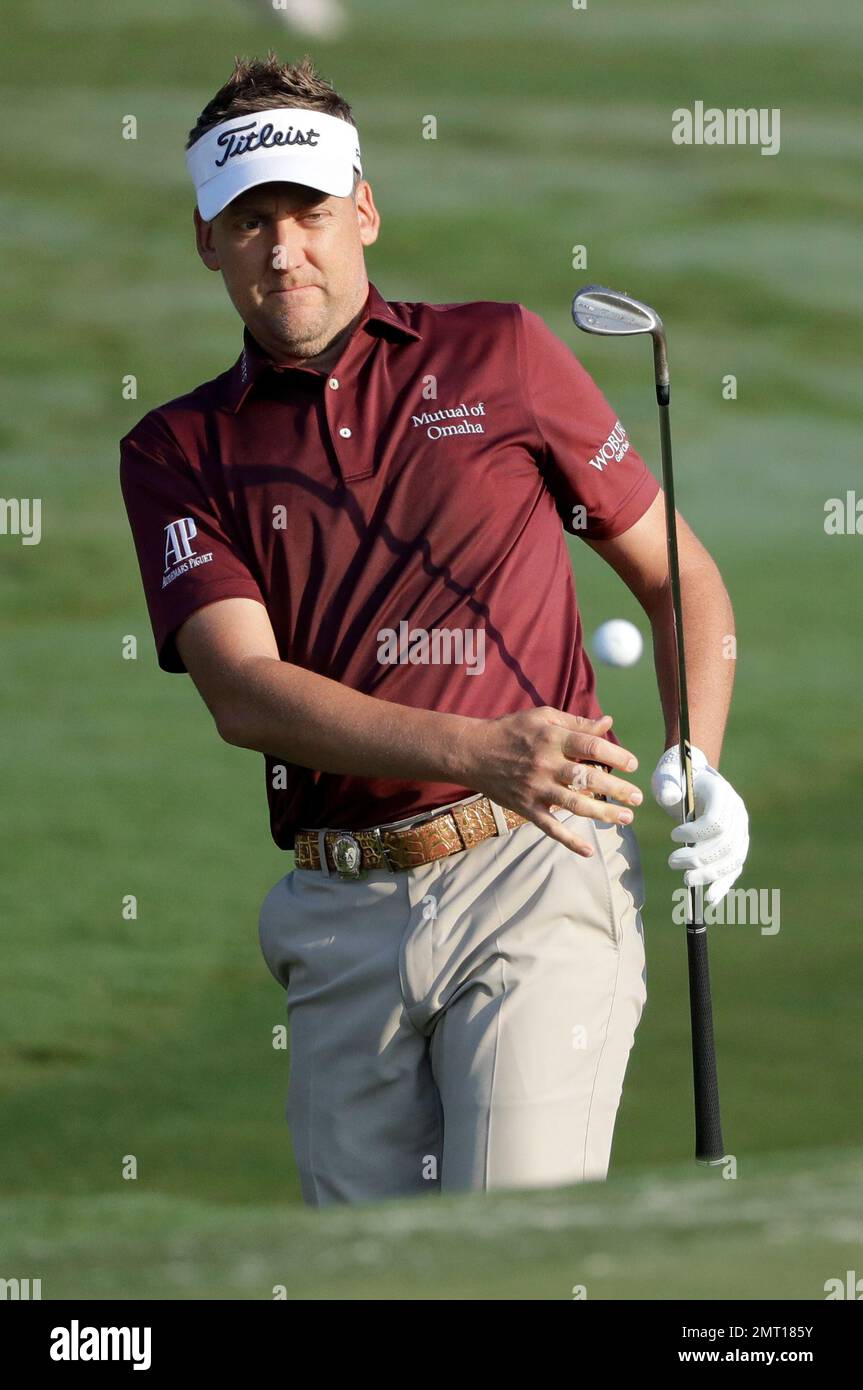 Ian Poulter of England, watches his chip on the 10th hole during the ...
