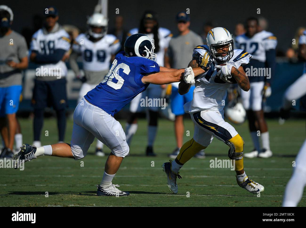 Los Angeles Chargers wide receiver Keenan Allen, right, tries to get by ...