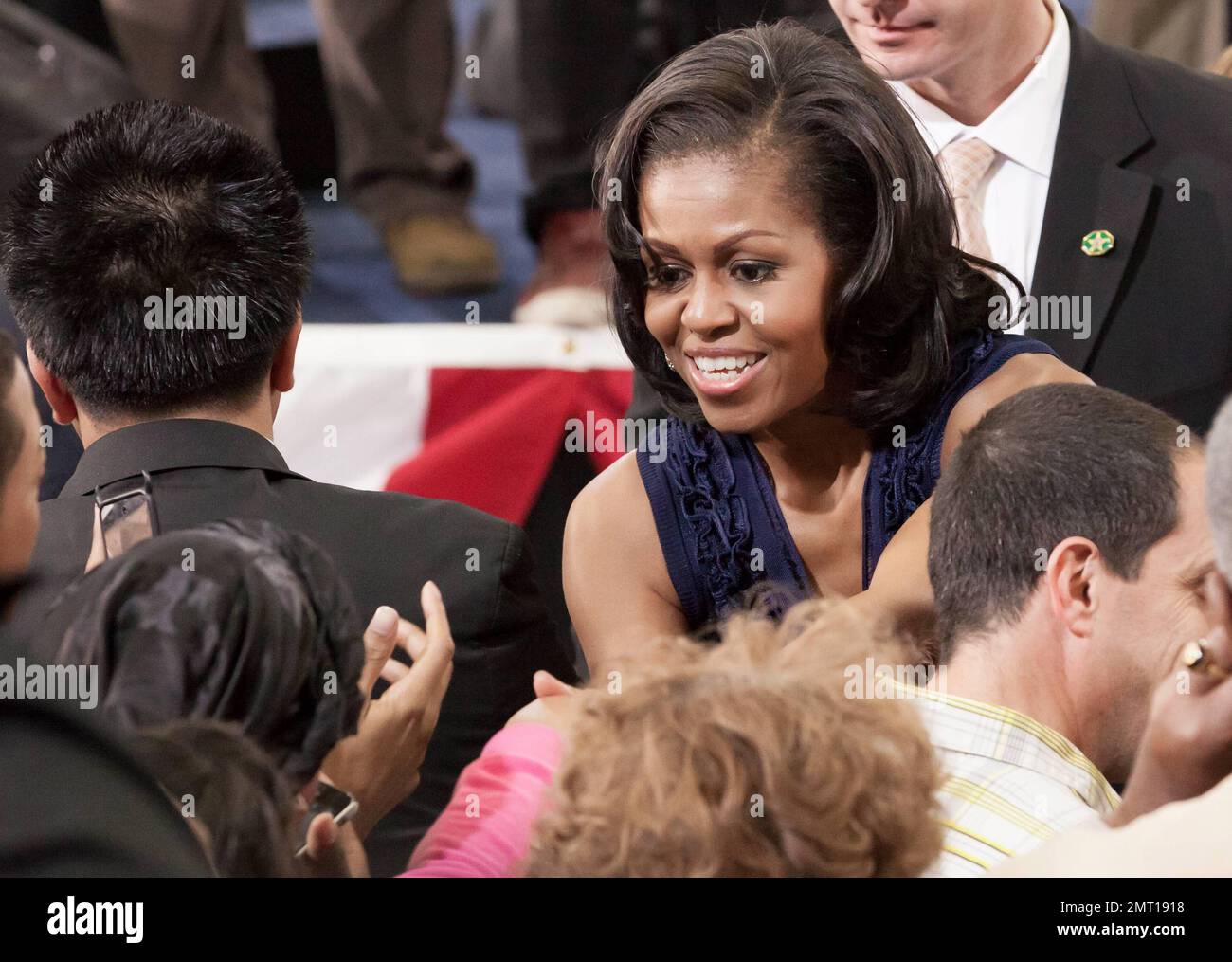 First Lady of the United States of America, Michelle Obama with support ...