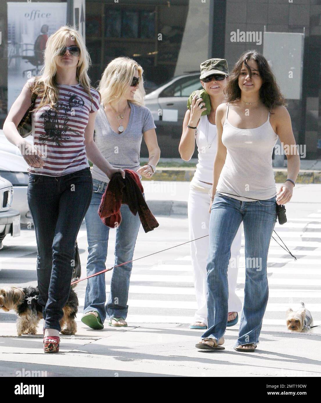 Exclusive!! Michelle Rodriguez takes her pooch for a walk with a group ...