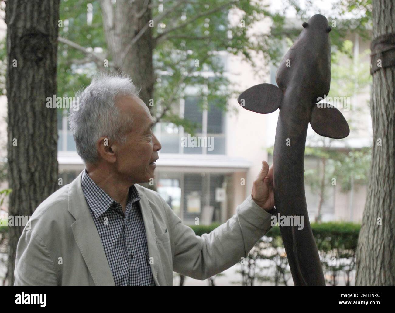 In this July 27, 2017 photo, Katsumi Tsukamoto, self-proclaimed "Dr ...