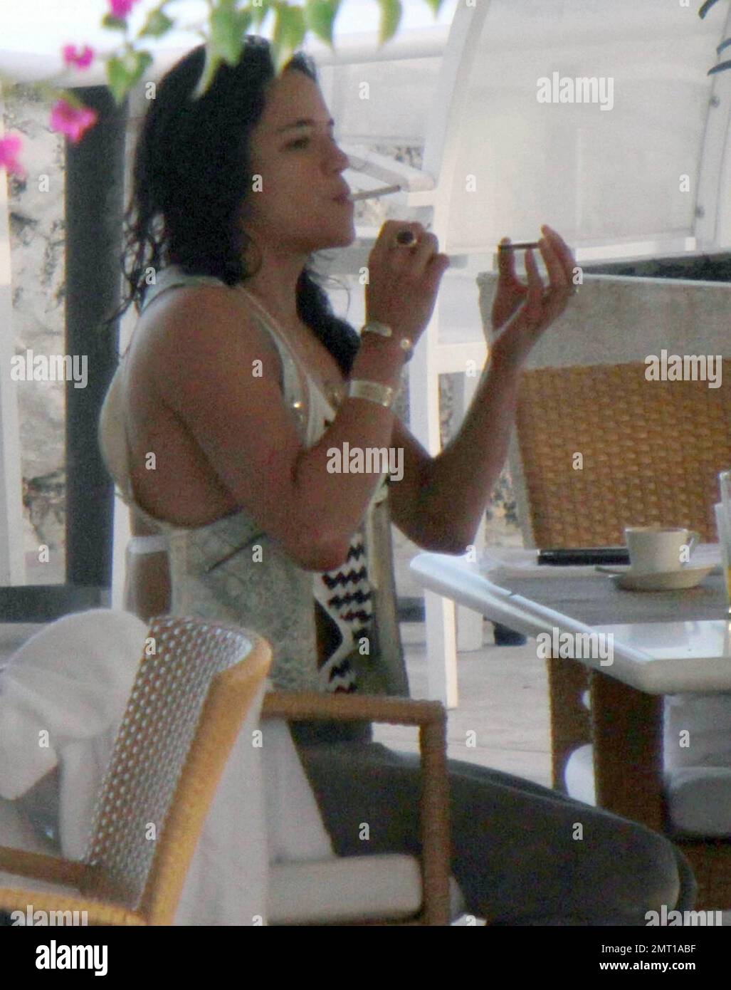 EXCLUSIVE!! Michelle Rodriguez wears a cut out one-piece swim suit as ...