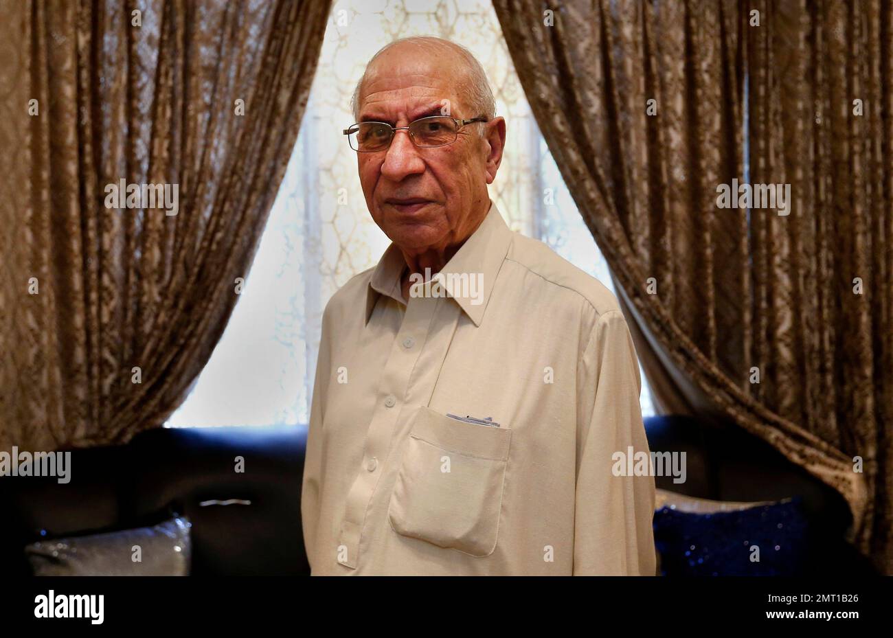 In this Aug. 1, 2017 photo, Pakistan's Mohammad Ishaq talks to the ...