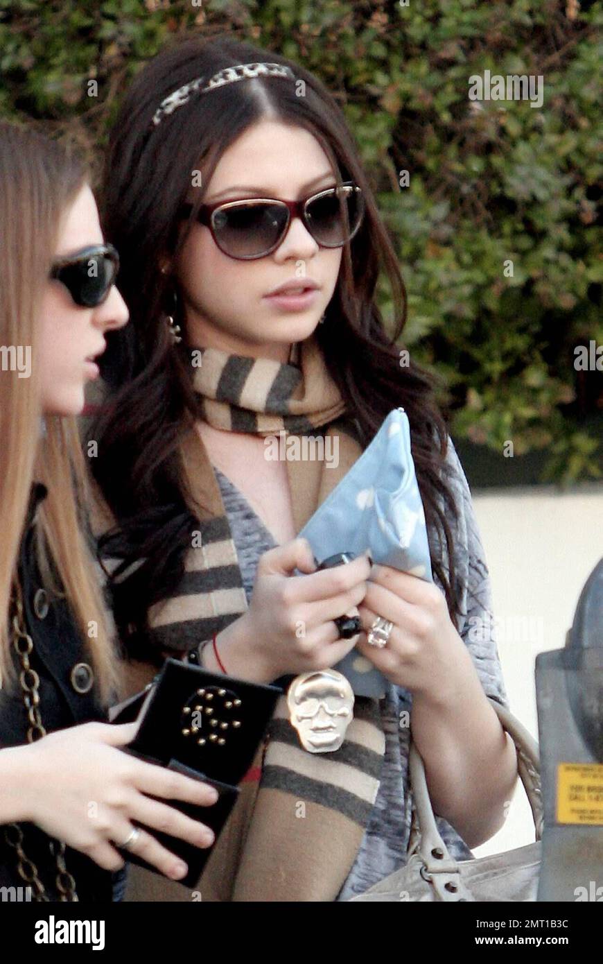 Exclusive!! Michelle Trachtenberg and her pal seem to be confused by a ...