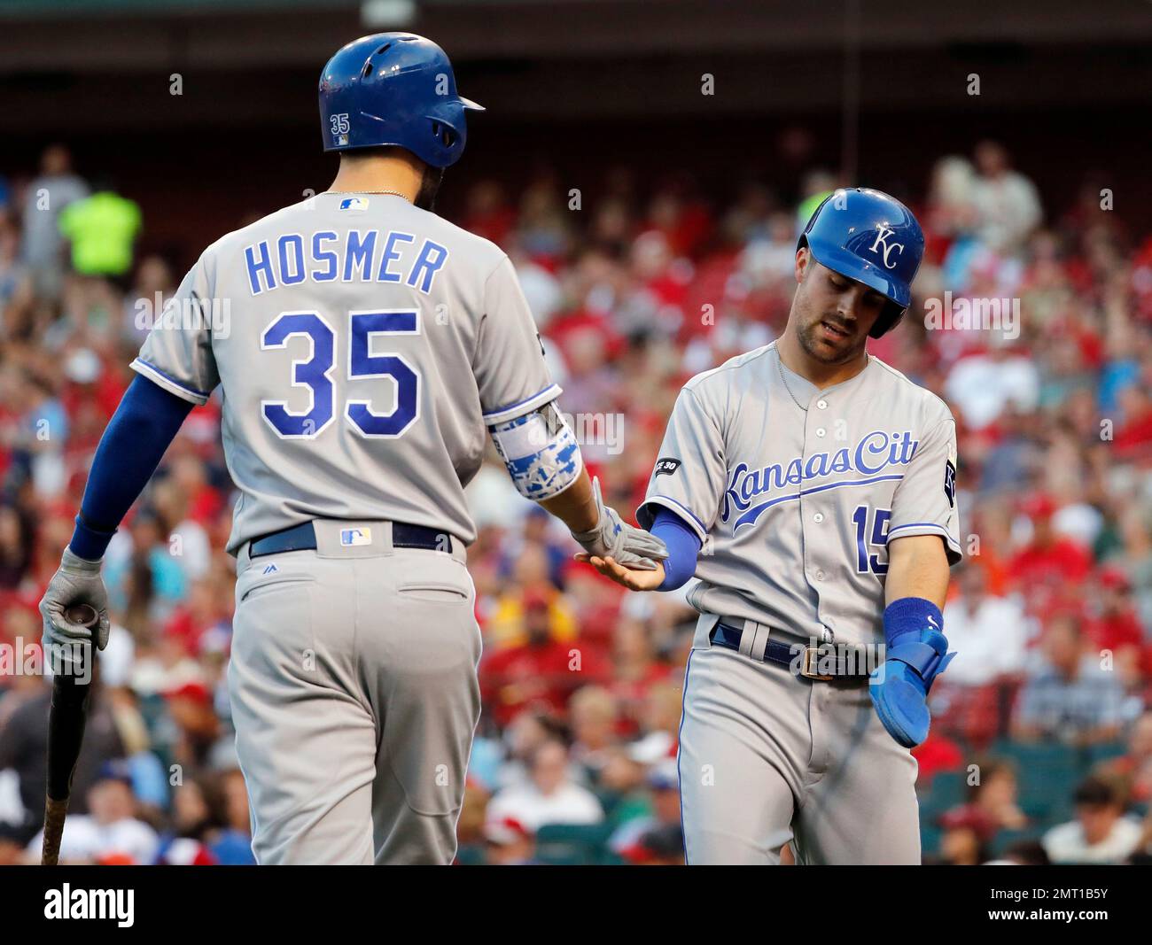 Kansas City Royals' Whit Merrifield, right, is congratulated by ...