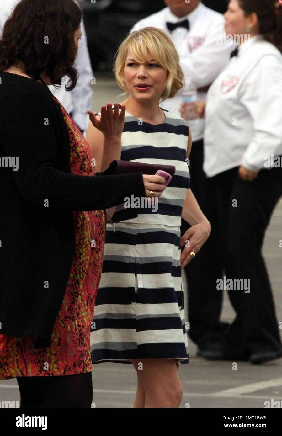 Michelle Williams greets fans before entering the Spirit Awards in ...