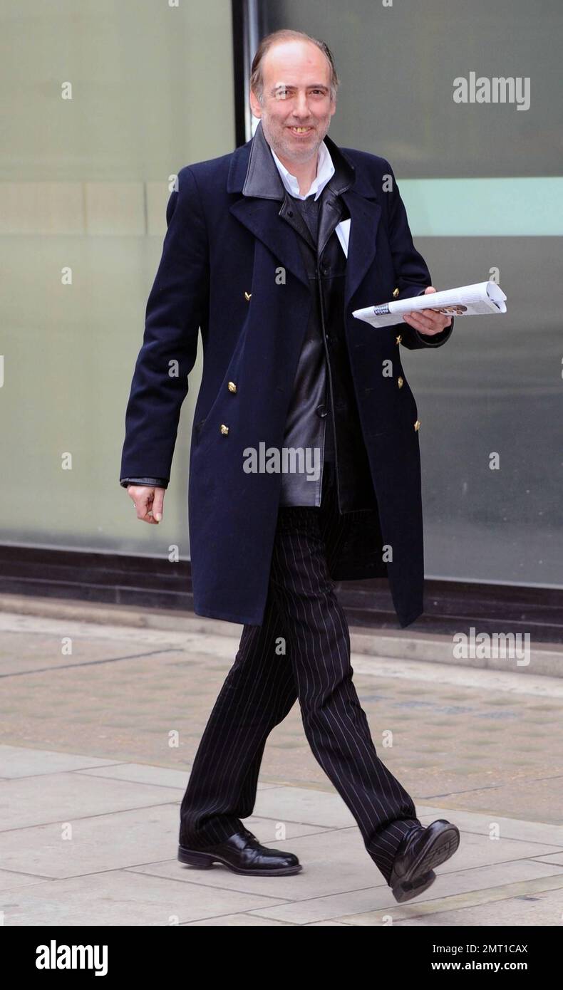 A legend of punk rock, The Clash's Mick Jones smiles for the cameras as ...