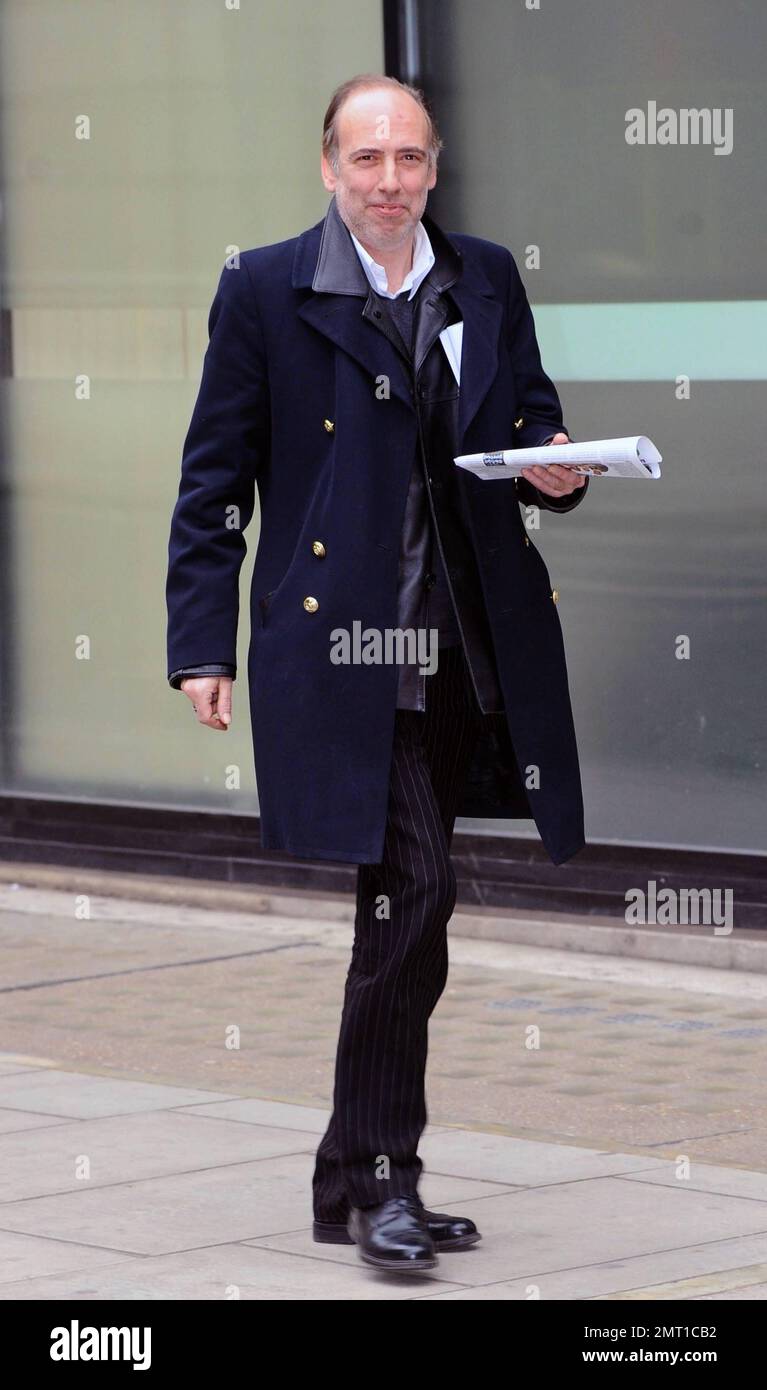 A legend of punk rock, The Clash's Mick Jones smiles for the cameras as ...